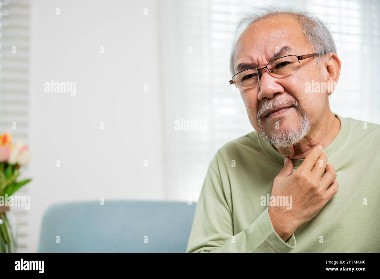 Asian old man painful in the sore throat, retirement senior man feeling ...