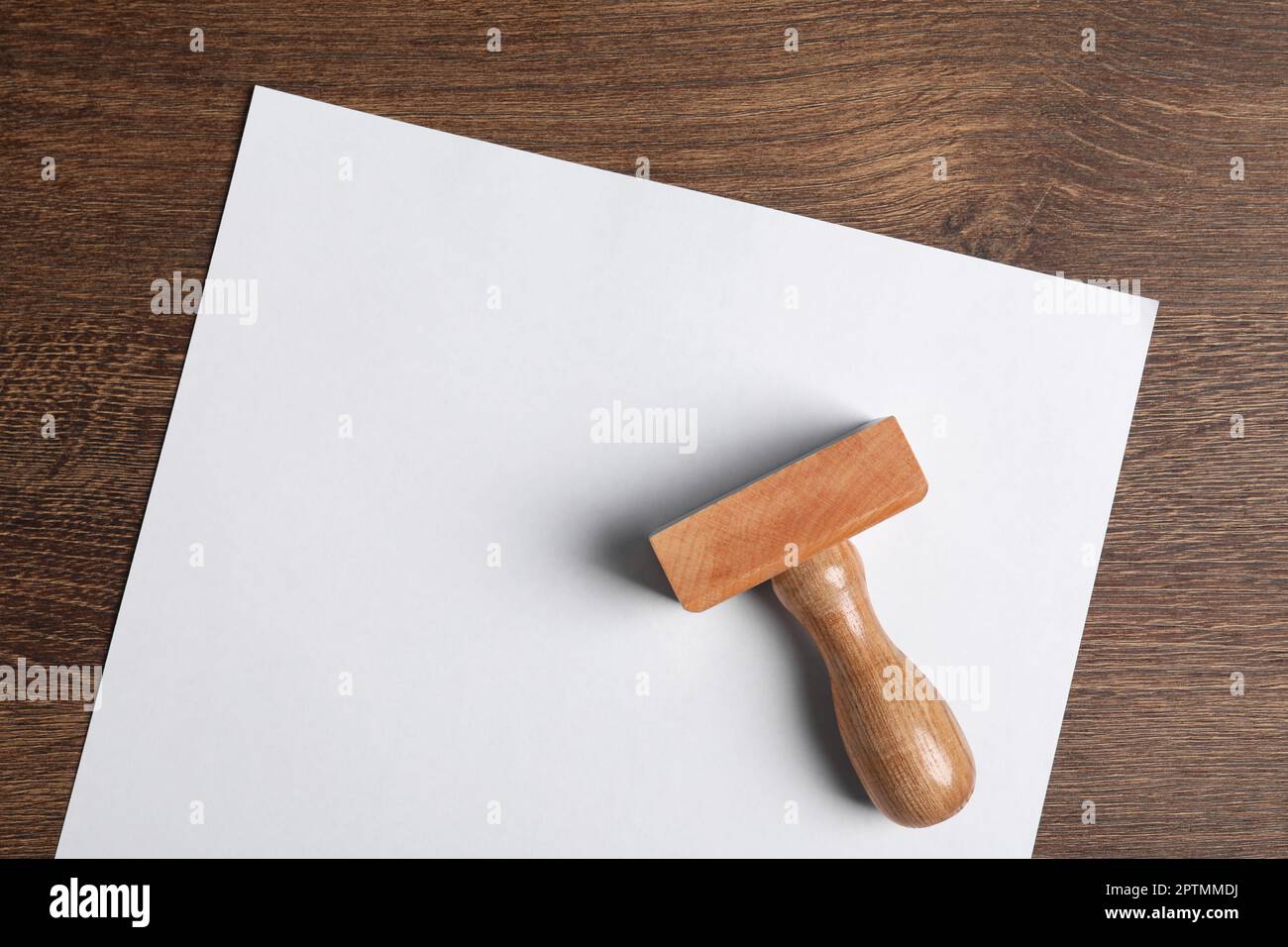 Blank sheet of paper and visa stamp on wooden table, top view Stock ...