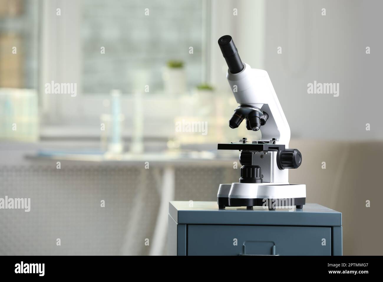 Modern medical microscope on drawer in laboratory, space for text Stock ...