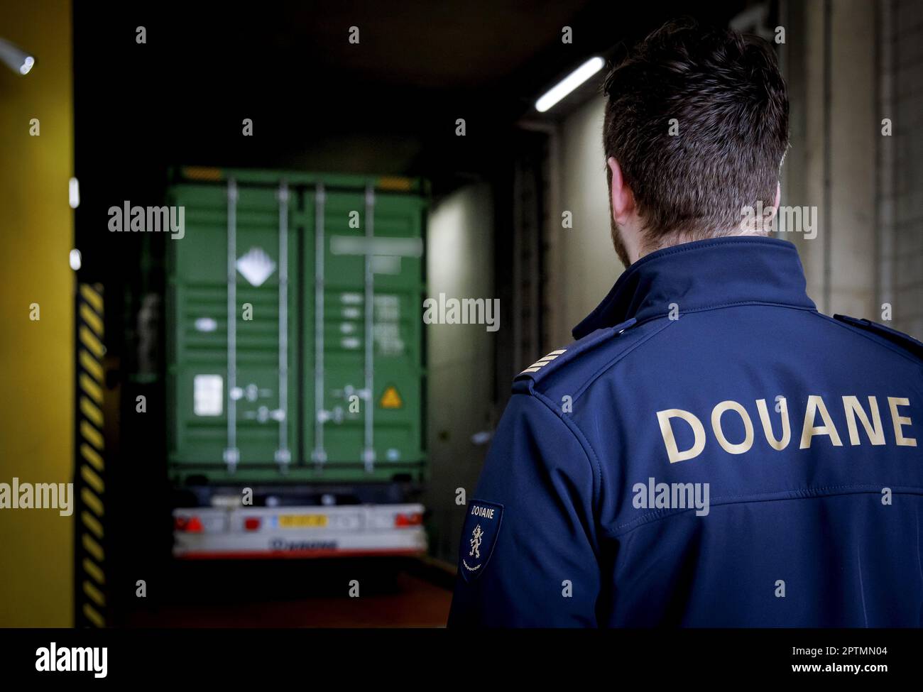ROTTERDAM - A customs officer of the Port of Rotterdam Customs in a ...