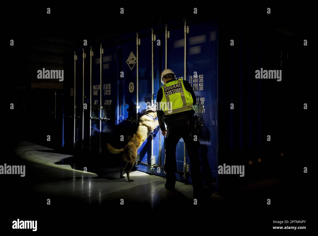 ROTTERDAM - A customs officer of the Port of Rotterdam Customs with a ...