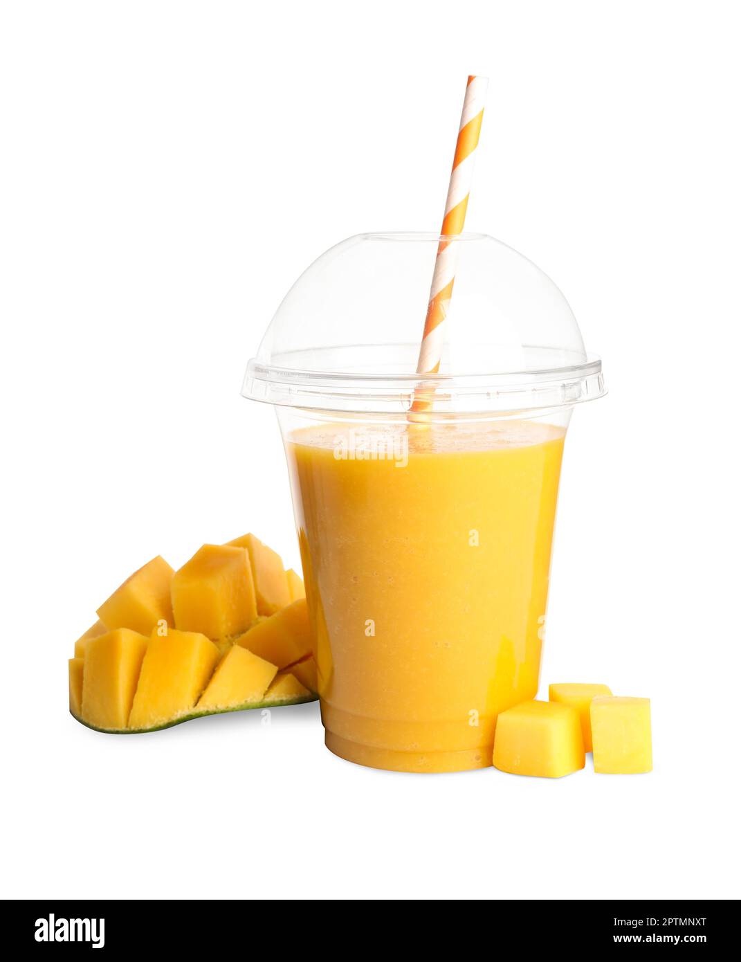 Plastic cup of tasty mango smoothie and fresh fruit on white background ...