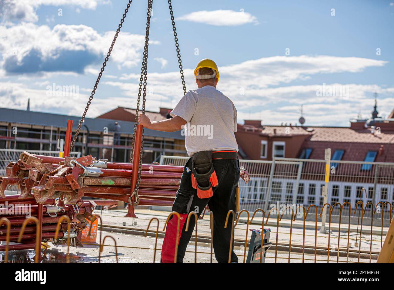 Worker operating a crane in a production facility in Graz, Austria ...
