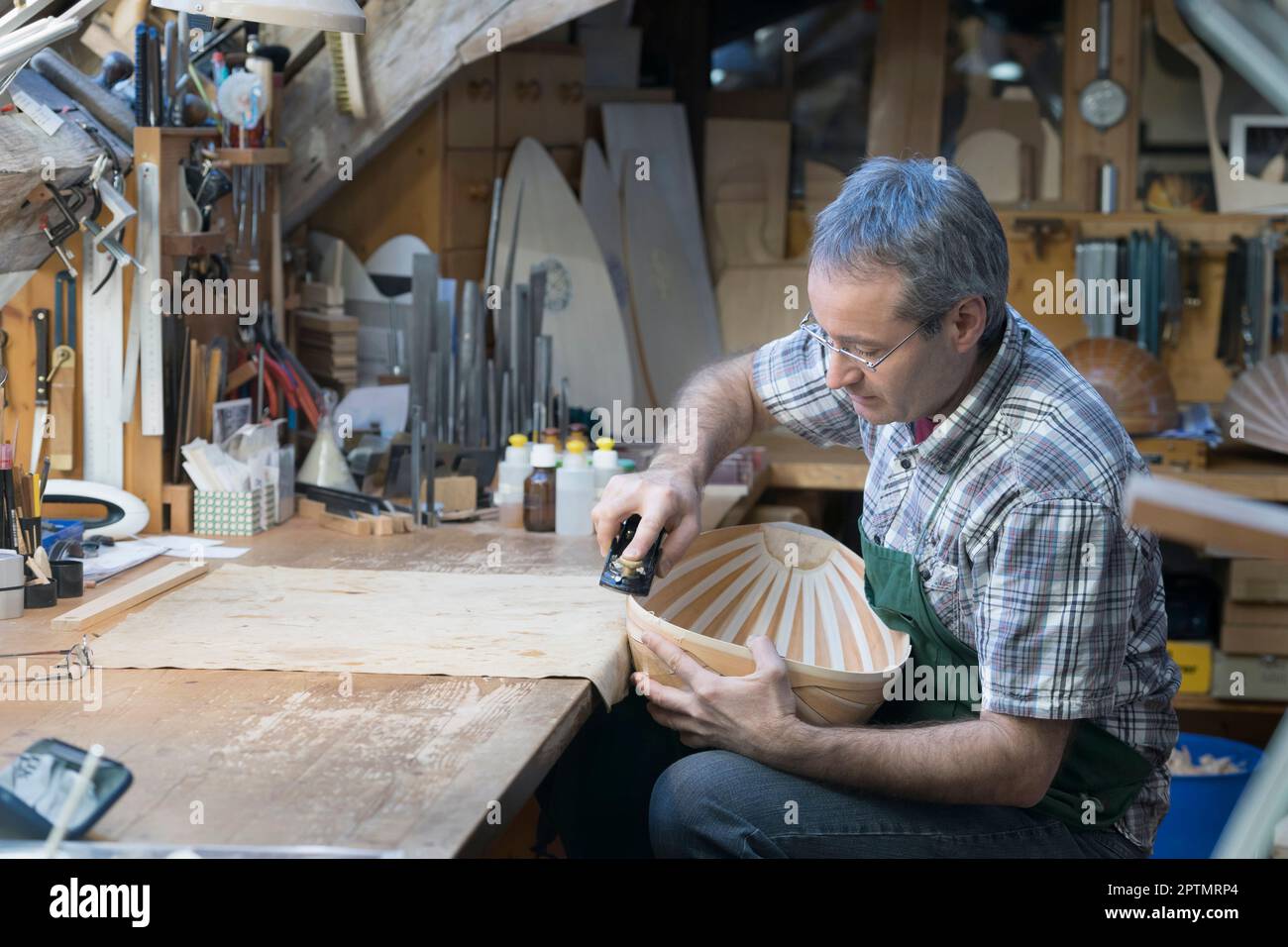 Craftsman manufacturing lute at workshop Stock Photo - Alamy