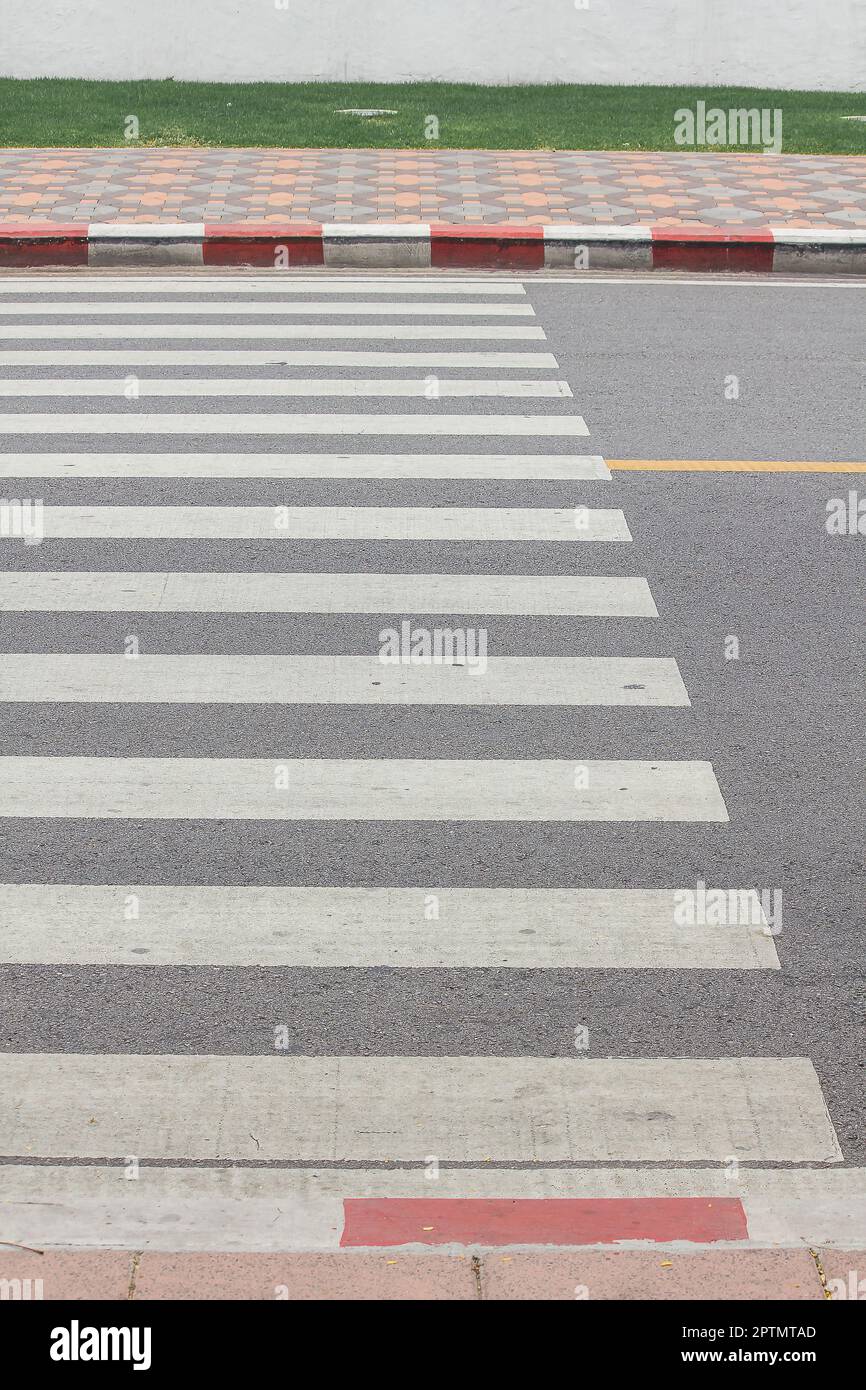 Crosswalk on the road Symbols for using across the road Stock Photo - Alamy
