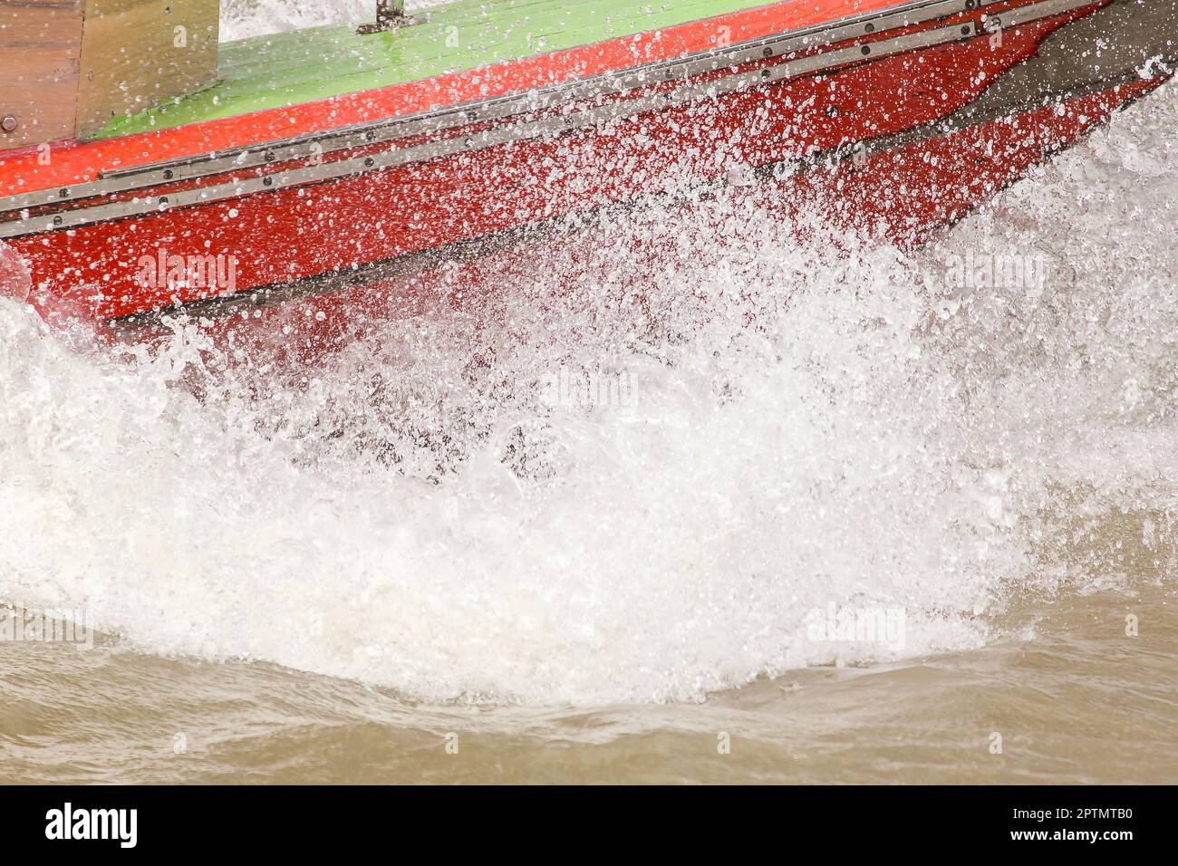 Water splashed from a speed boat in the river Stock Photo - Alamy