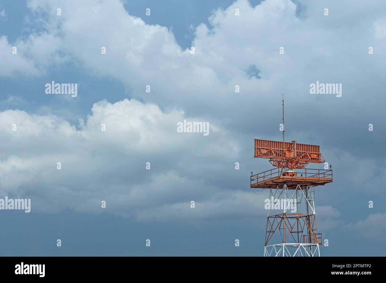 Red-and-white airport radar in daylight Stock Photo - Alamy