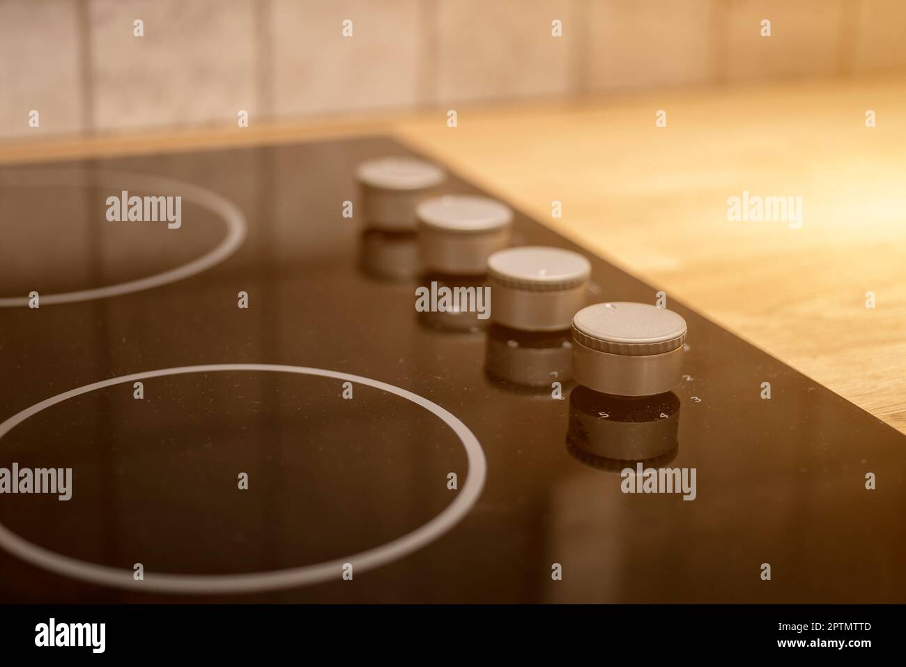 Electric cooker plate switch button technology food Stock Photo - Alamy