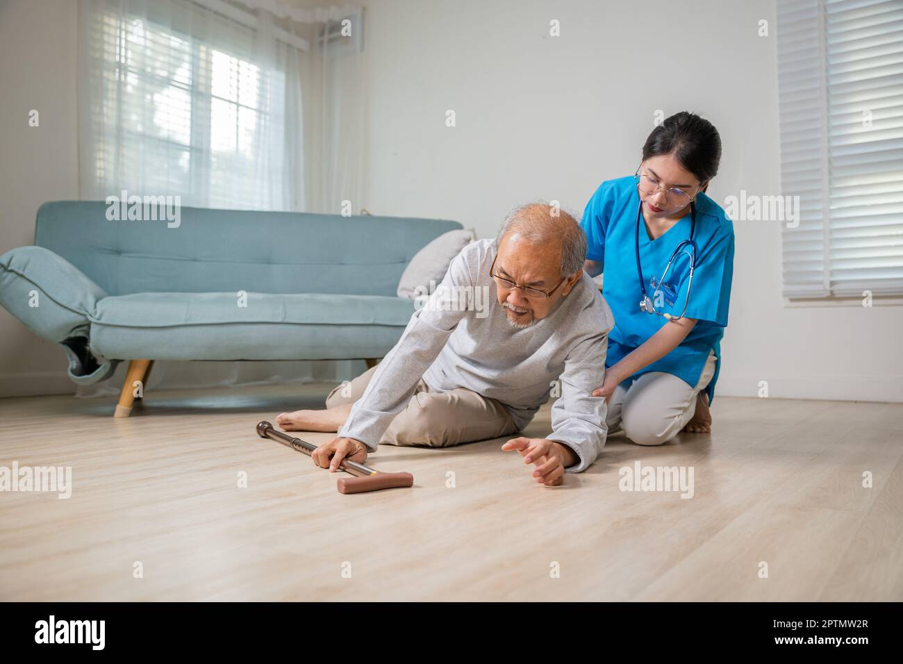 Disabled elderly old man patient with walking stick fall on floor and ...
