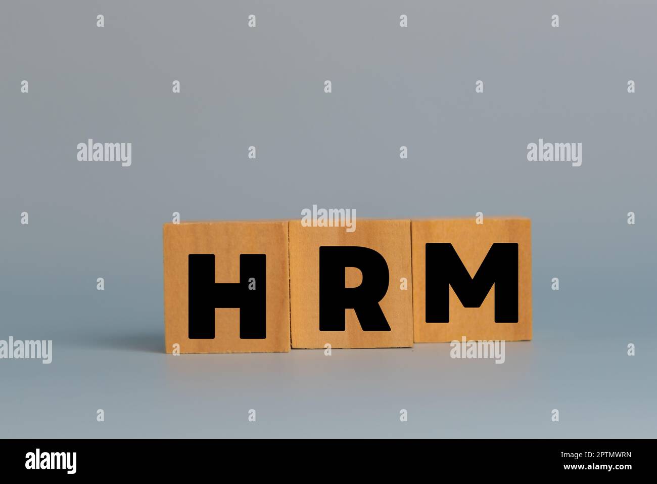 Wood cube HRM human resources management on background.Business ...