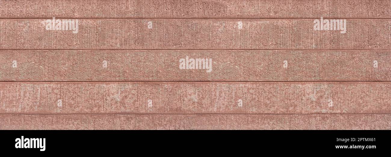 Red concrete wall with several horizontal grooves Stock Photo - Alamy
