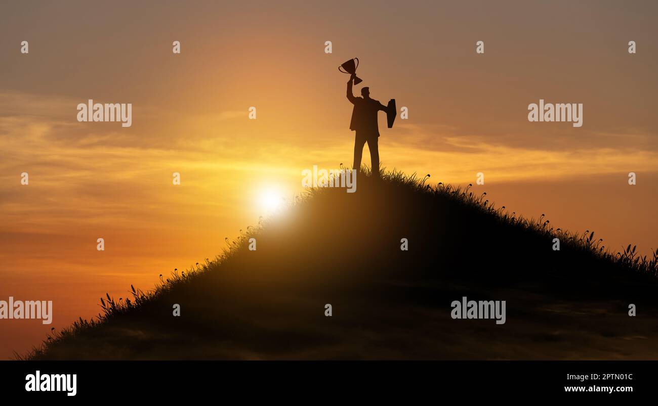 Silhouette victory businessman with trophy climbed to the top of ...
