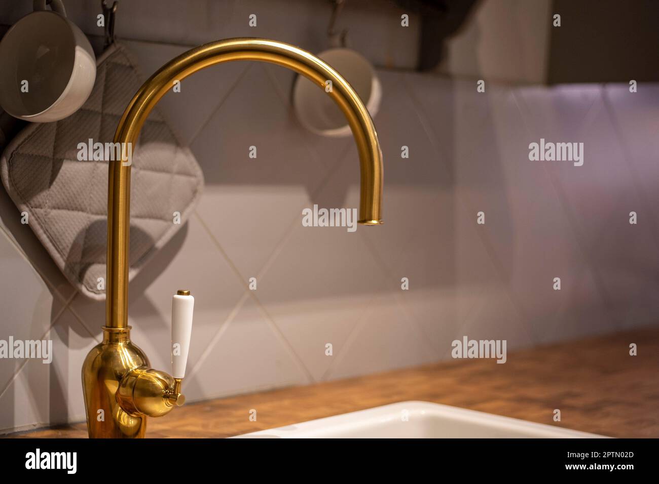 Water tap faucet in the kitchen for background Stock Photo - Alamy
