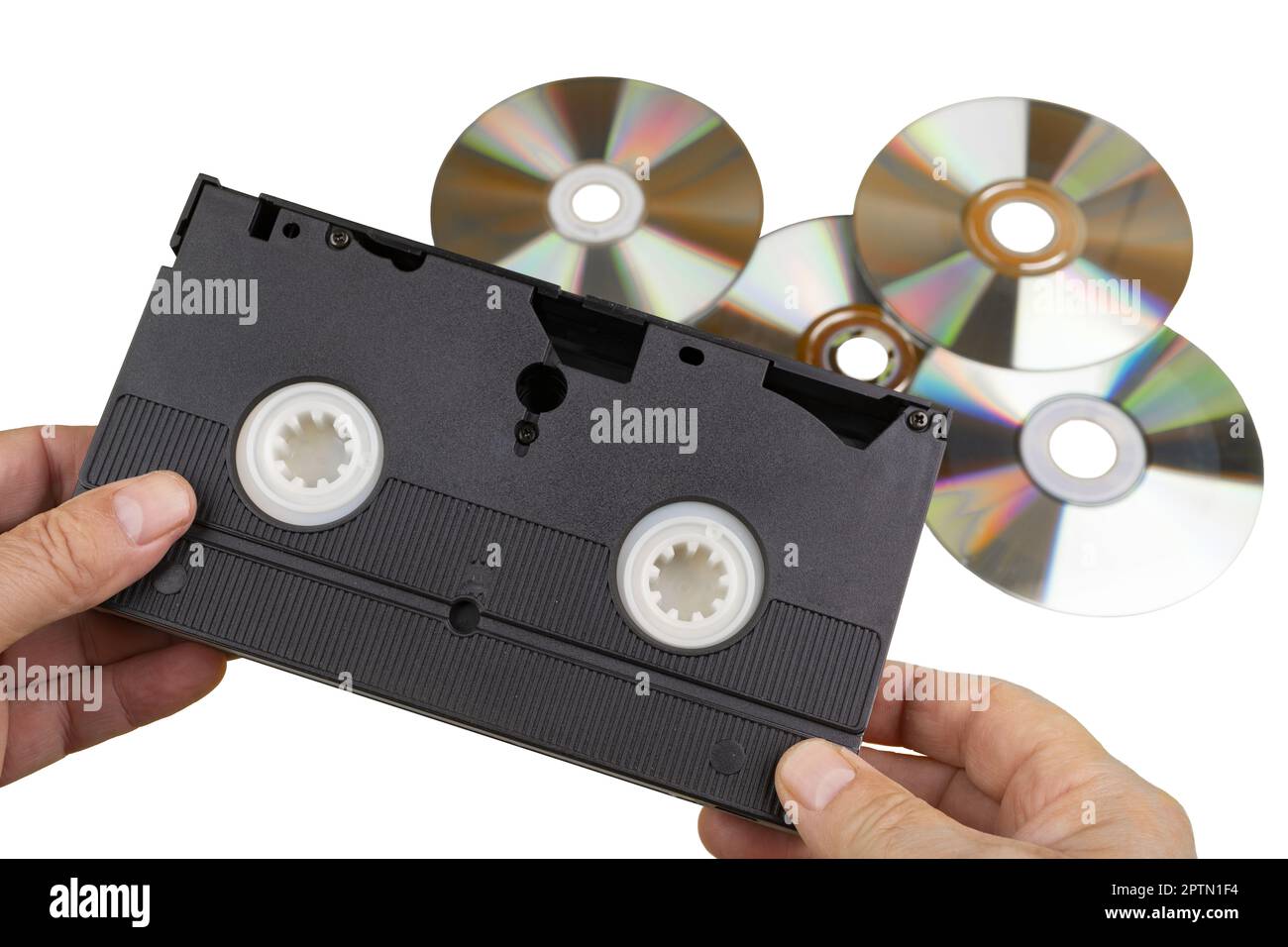 An old VHS videotape and some CDs Stock Photo - Alamy