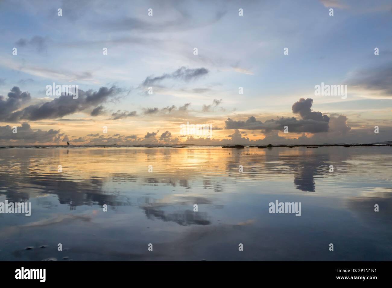 Bali beach with dramatic sky and sunset hi-res stock photography and ...