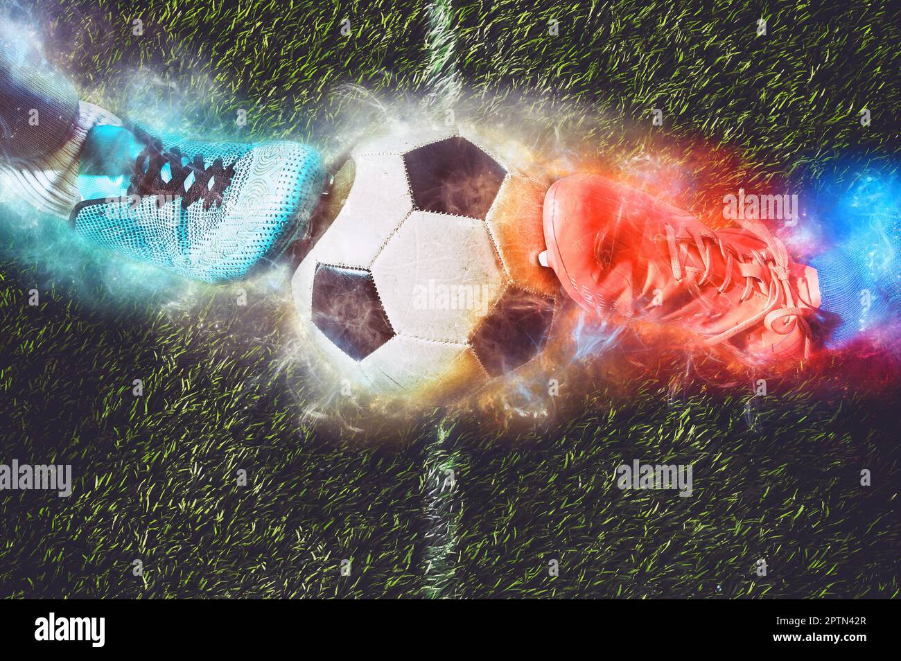 Two opposing players in front of the soccer ball Stock Photo - Alamy