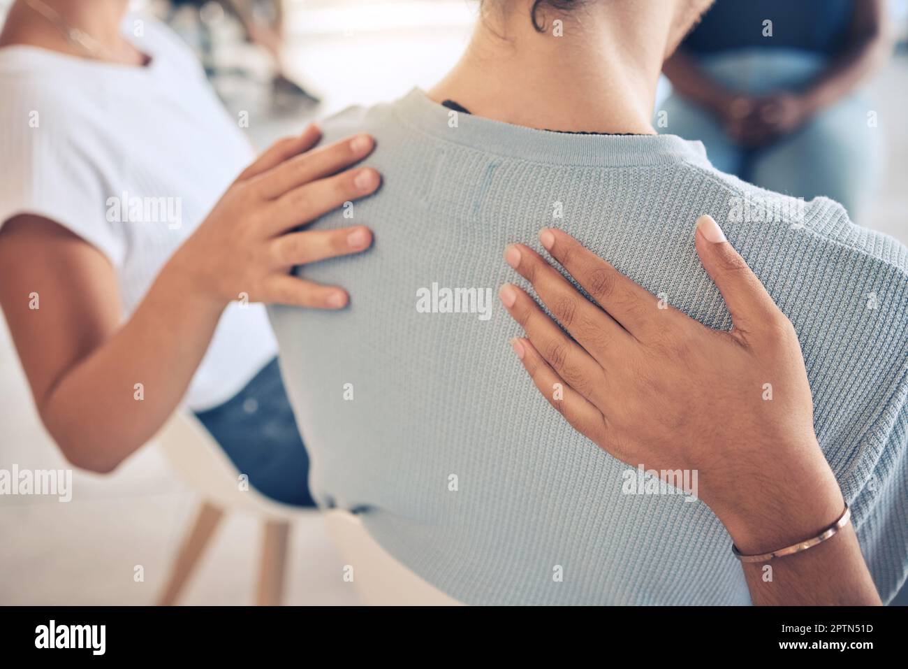 Hands, mental health and support in group therapy for woman suffering ...