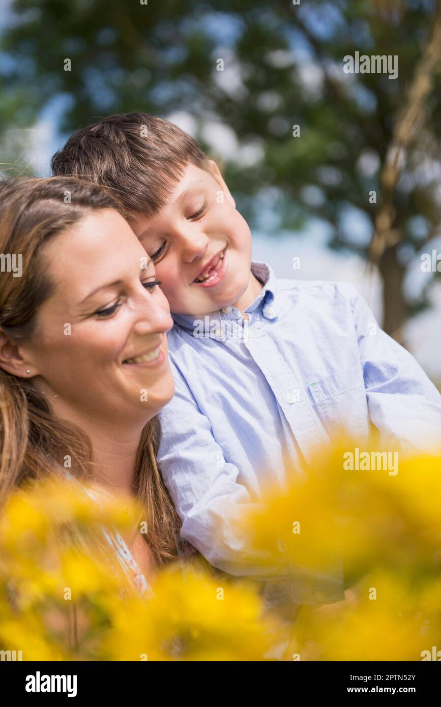Mother with her son smiling in the countryside, Bavaria, Germany Stock ...