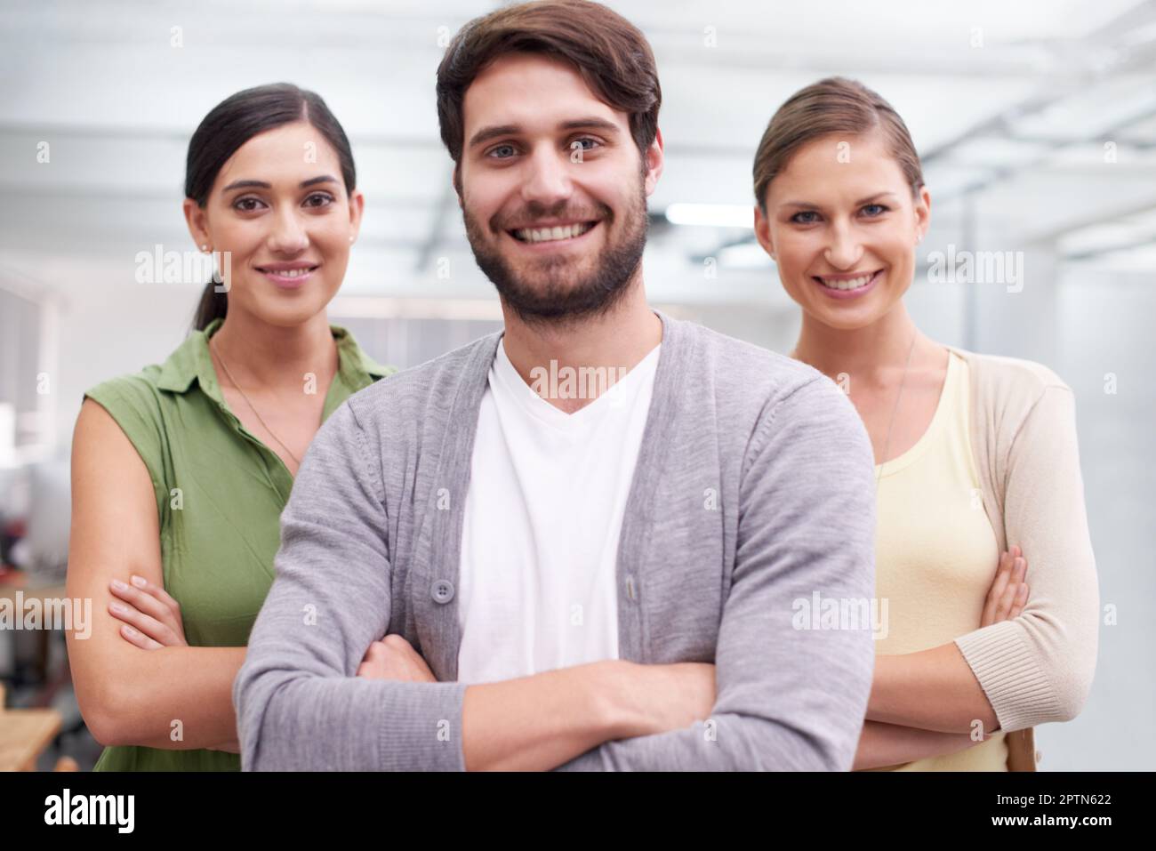 Were the best in our business. three work colleagues in the office ...