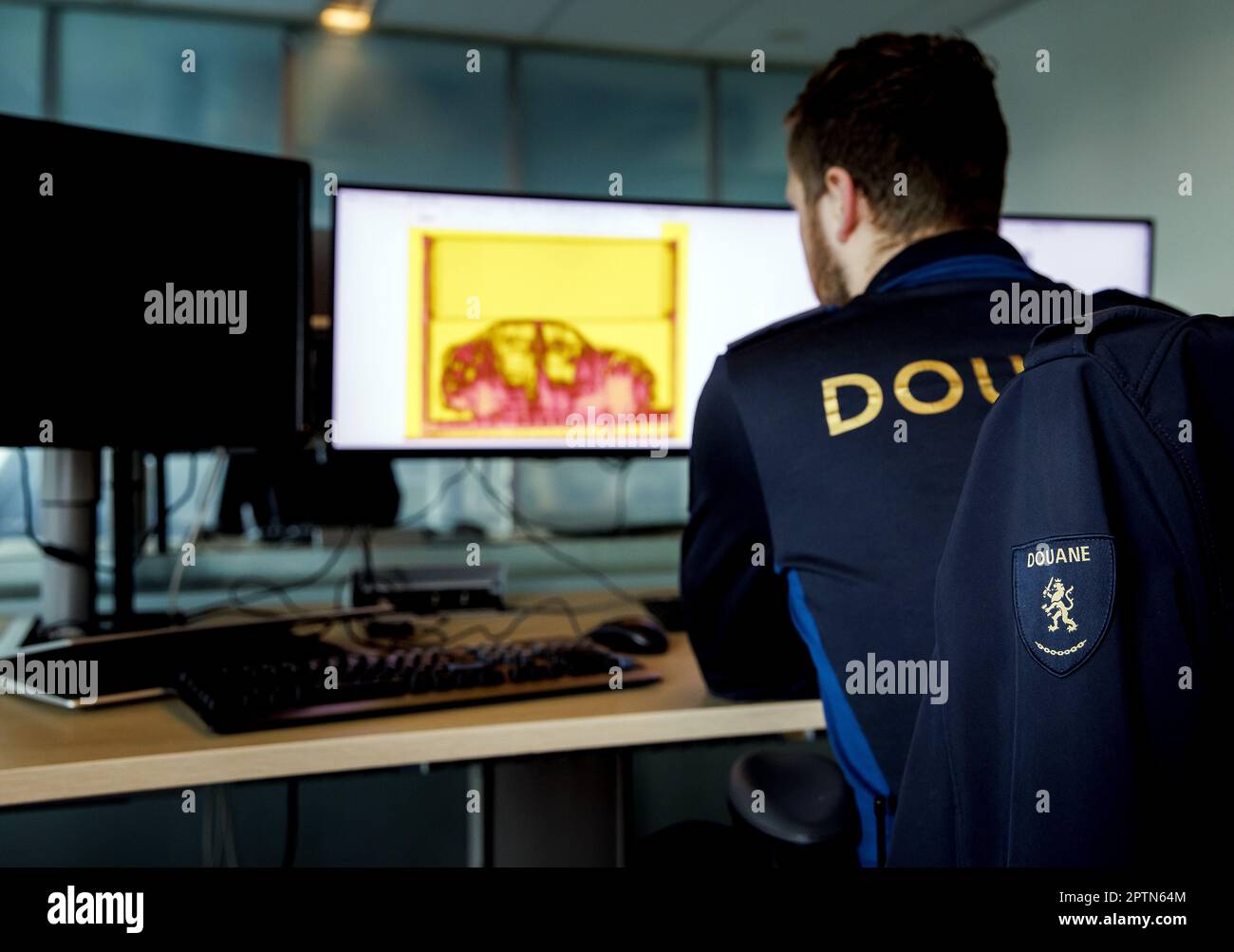 ROTTERDAM - A customs officer of the Port of Rotterdam Customs examines ...