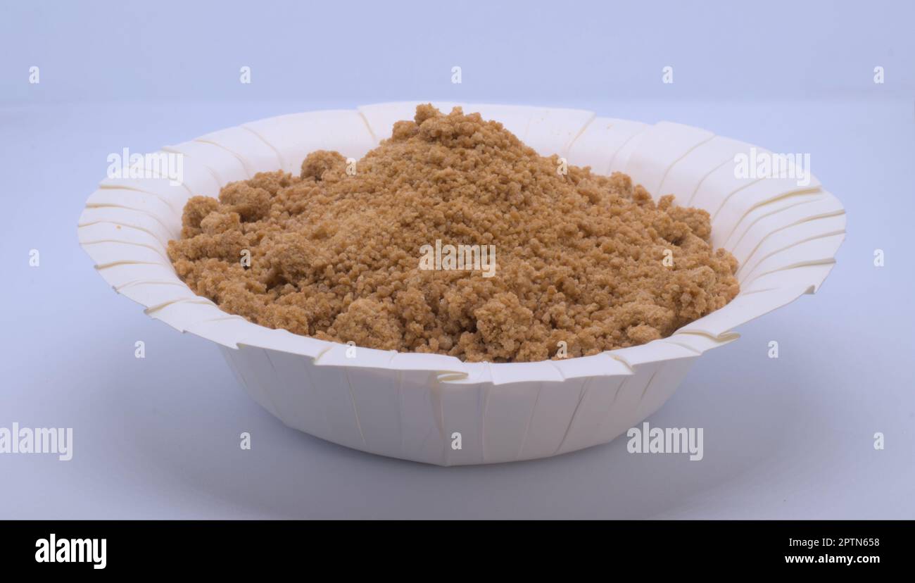Organic Jaggery Powder on white background Stock Photo - Alamy