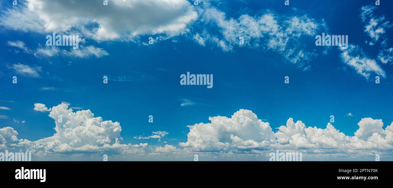 Deep blue sky and different types of white clouds in it. Beautiful ...