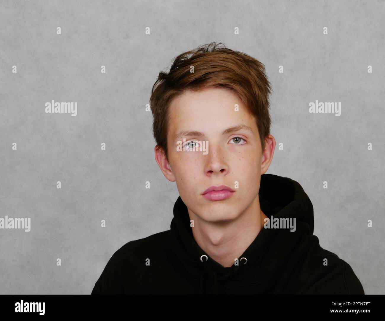 Close-up portrait in full-face of a handsome, enthusiastic young Stock ...