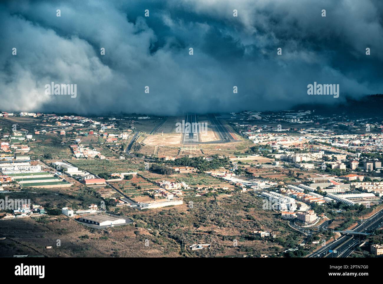 Airport runway partially covered by clouds. Los Rodeos, Tenerife Stock ...
