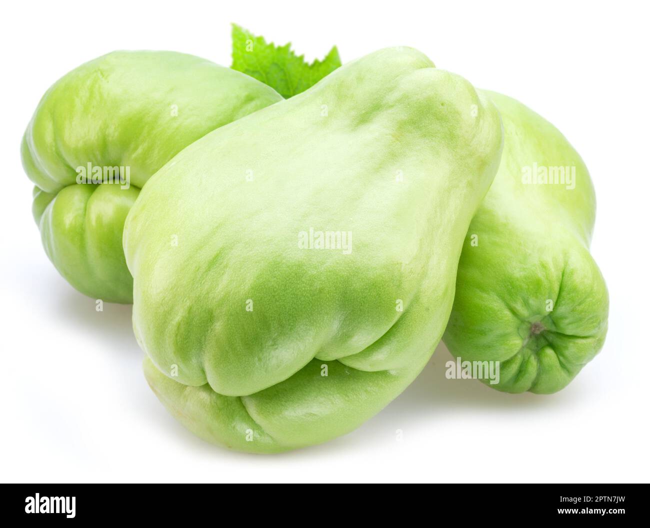 Chayote fruits isolated on white background Stock Photo - Alamy