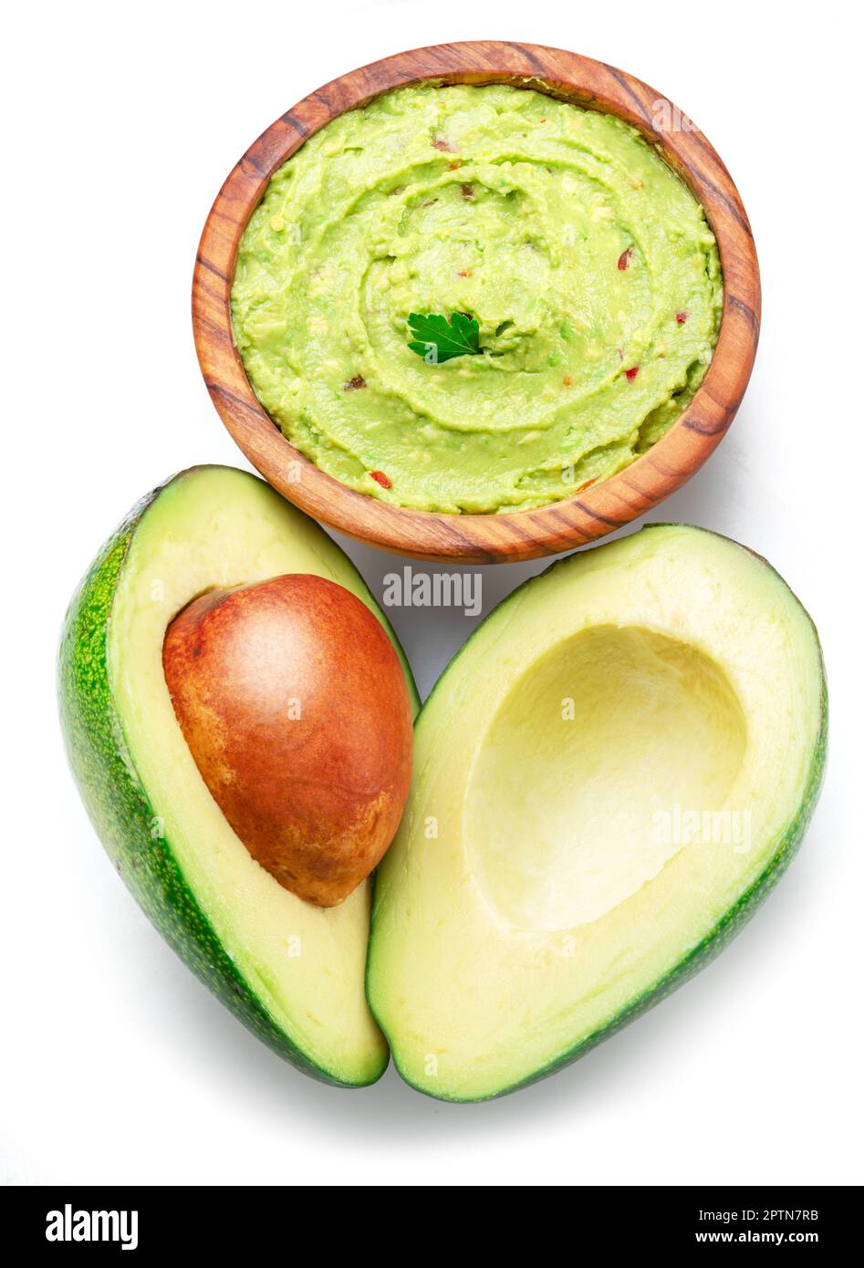 Guacamole sauce and avocado fruit cross cut isolated on white ...