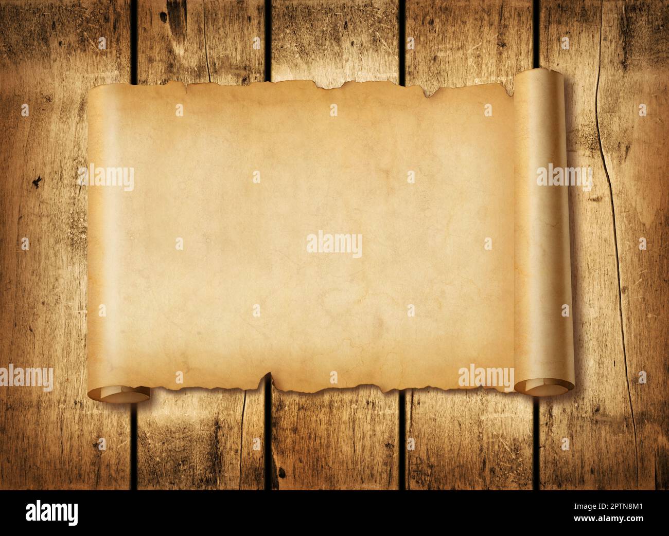 Old mediaeval paper sheet. Horizontal parchment scroll on a wood board ...