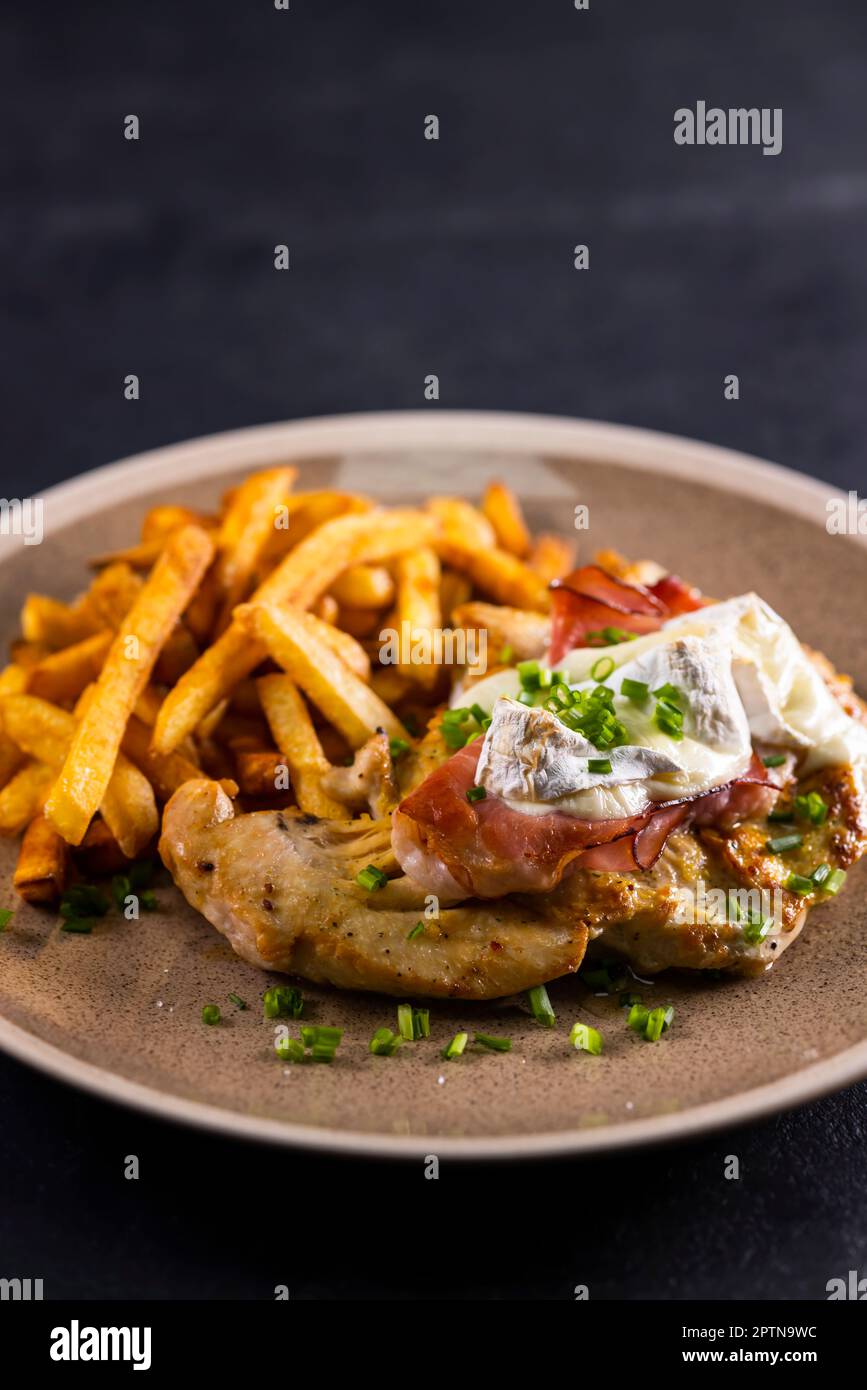 typical czech cuisine chicken slice baked with ham and camembert with ...