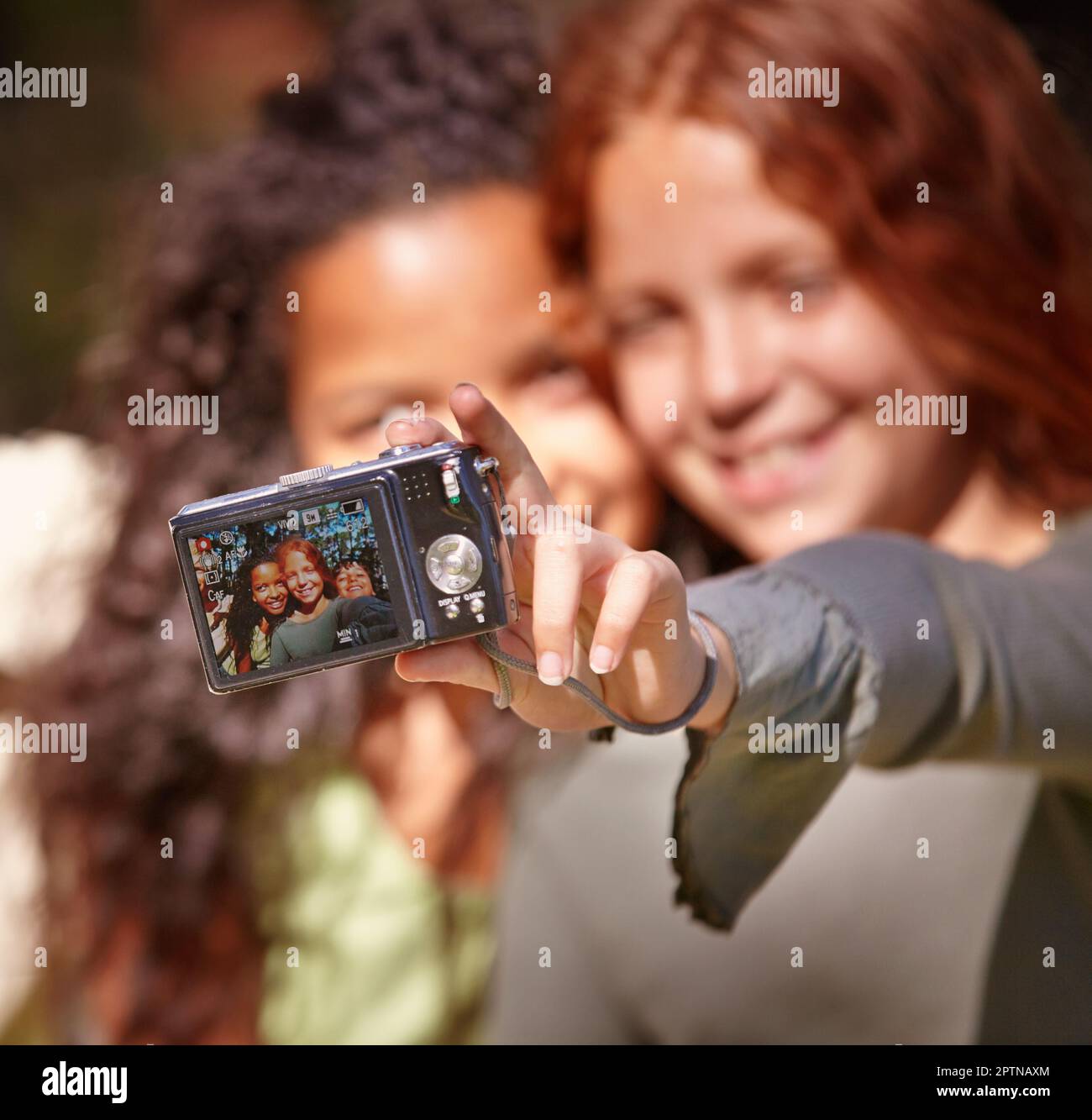 Capturing everlasting memories. a two young girls taking a self ...