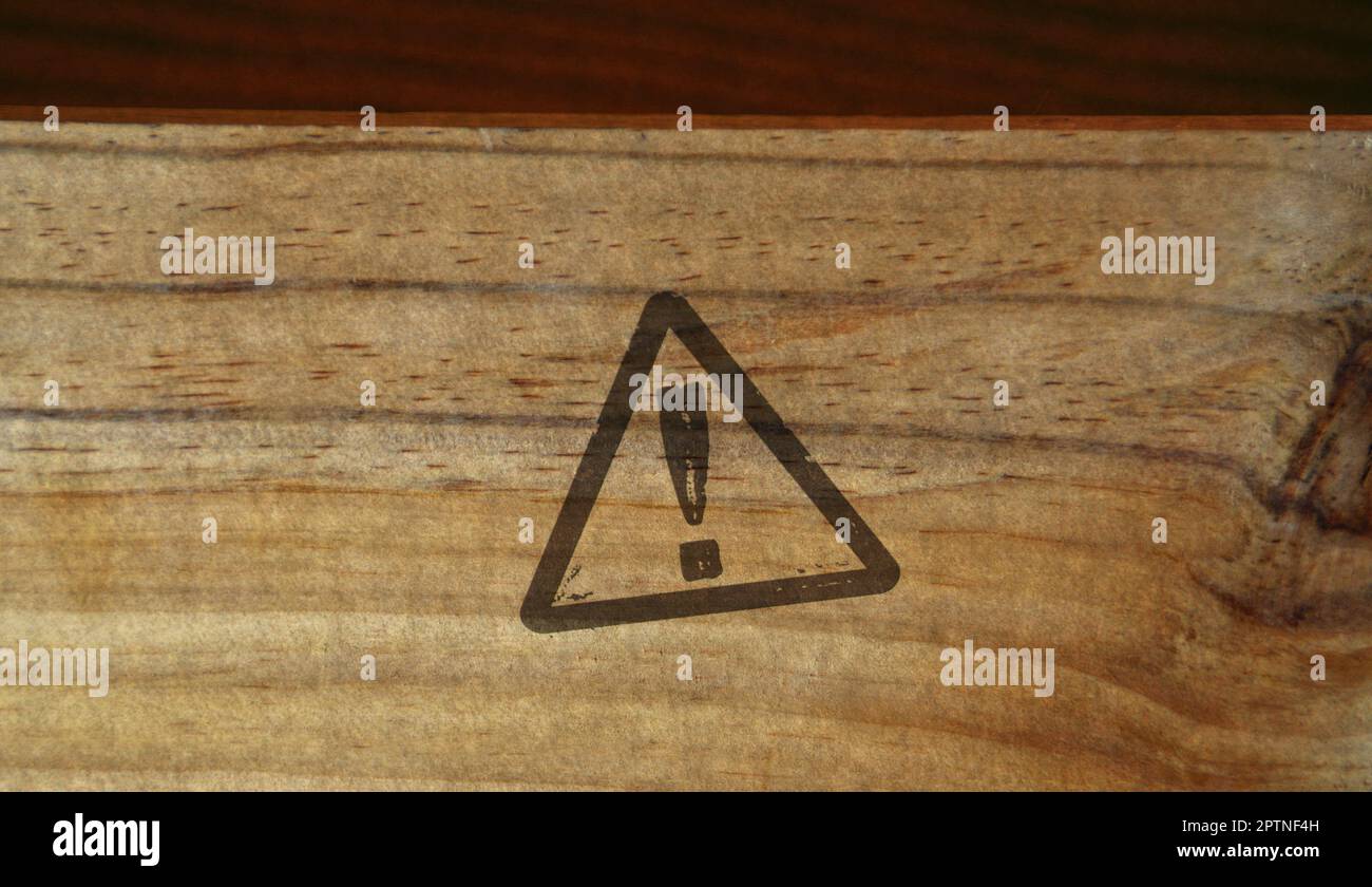 Alert stamp printed on wooden box. Danger alarm, security warning ...