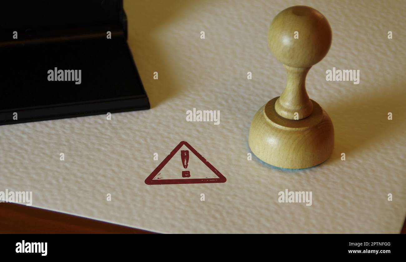 Alert stamp and stamping hand. Danger alarm, security warning caution ...