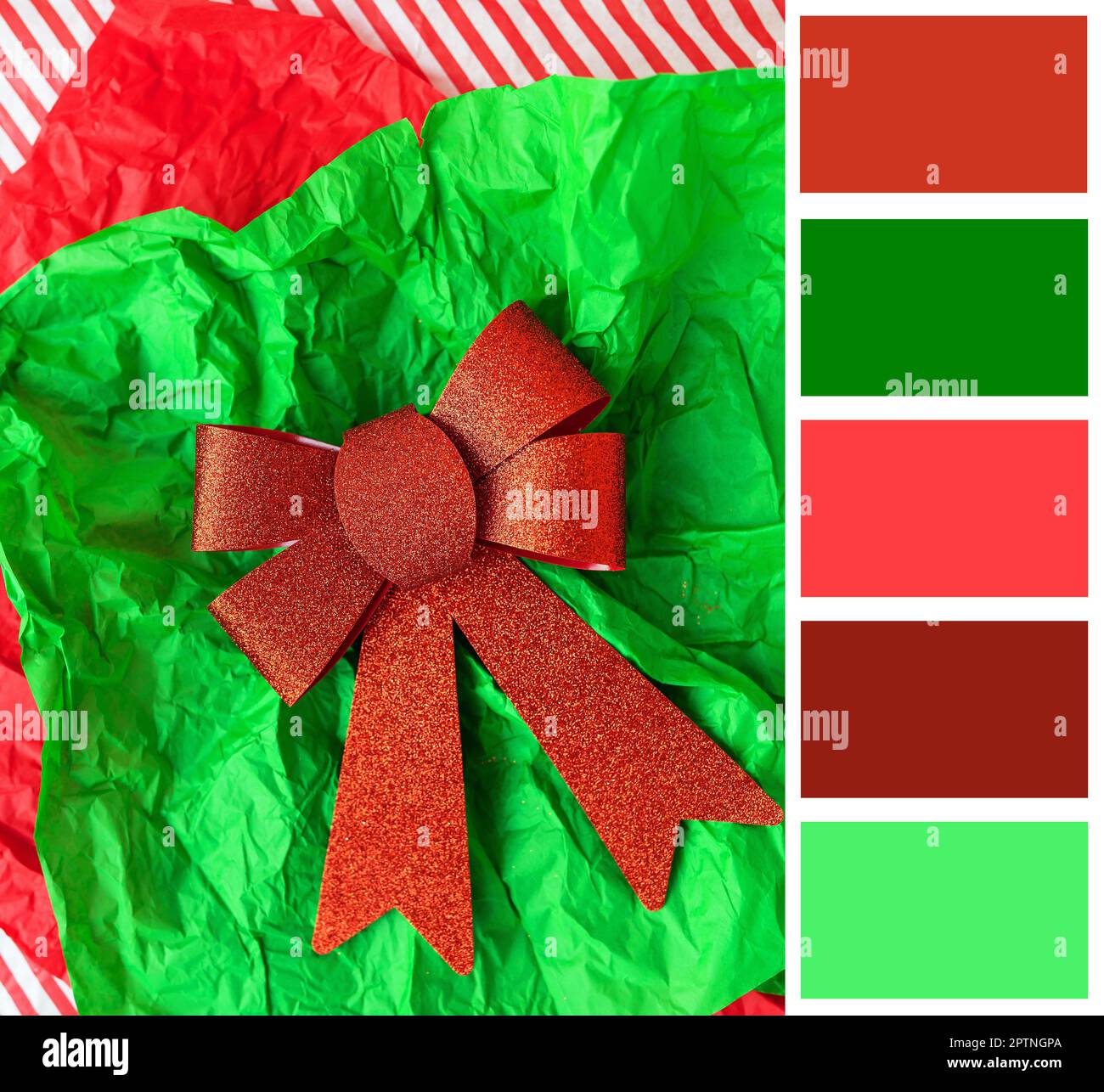 Flat lay beautiful red bright four loops holiday gift bow with satin ...