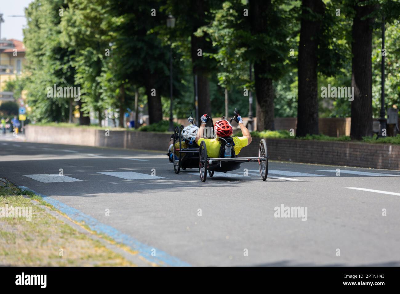 Couple of Athletes training with Their Special Bikes on a City Track ...
