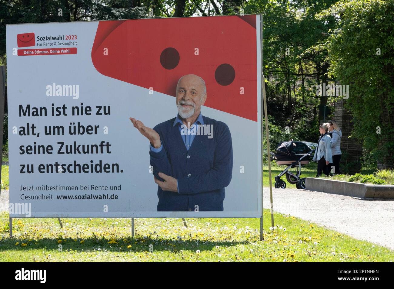 A large poster as an election call for the 2023 social elections on May ...