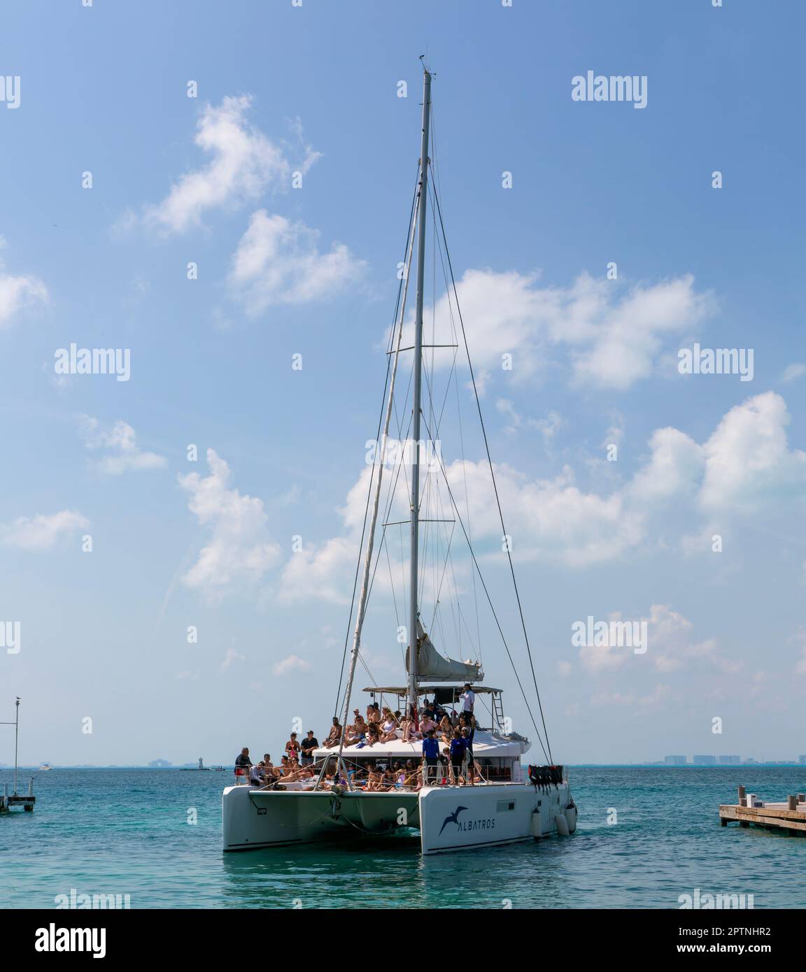 Tour boat crowded with people on deck, Isla Mujeres, Caribbean Coast ...