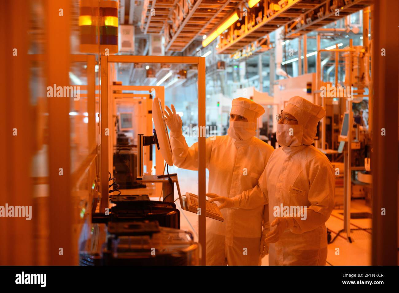 Dresden, Germany. 26th Apr, 2023. Employees of the Infineon chip group ...