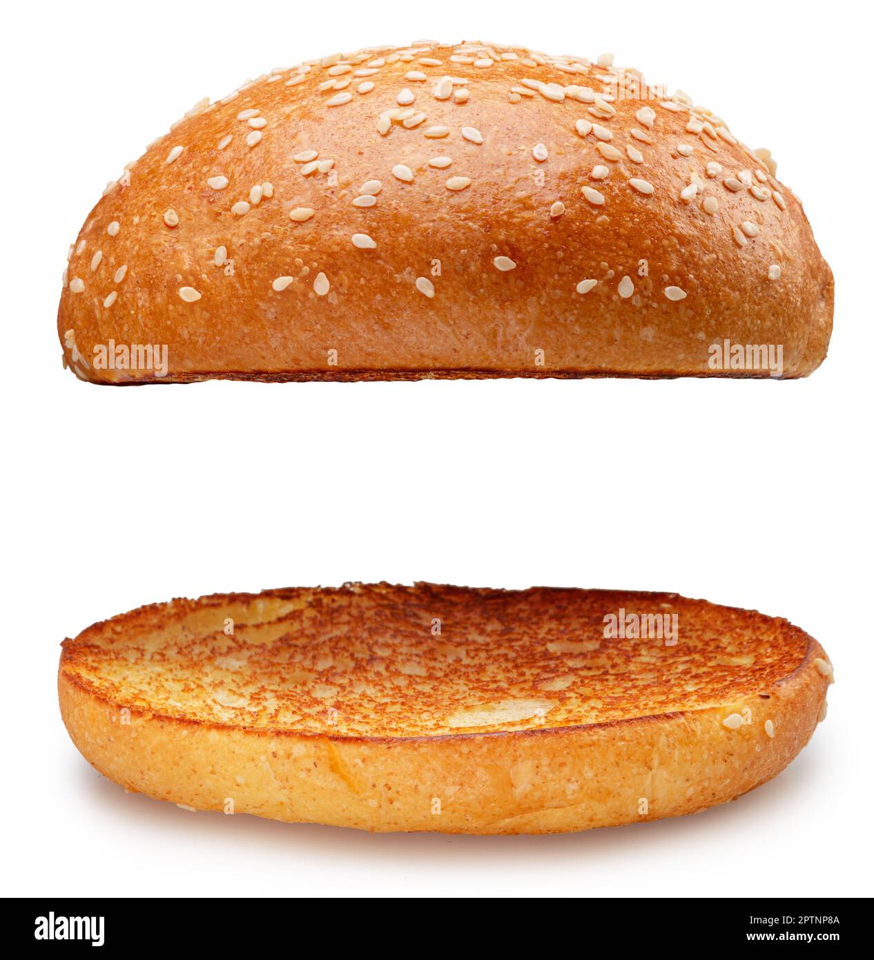Two parts of hamburger bun with sesame seeds on white background ...