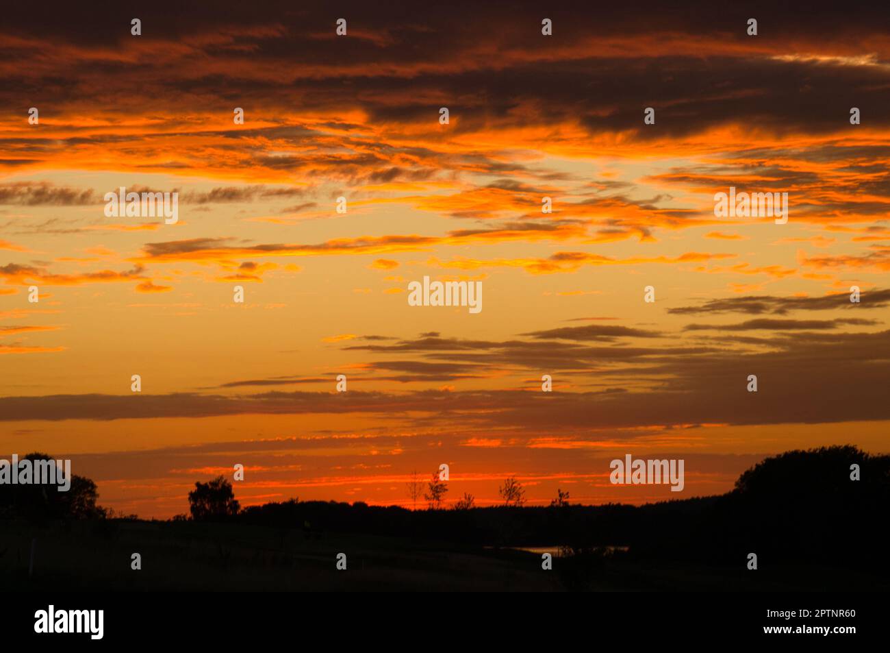 burning sky. Sunset with extreme colors. clouds and light atmosphere ...
