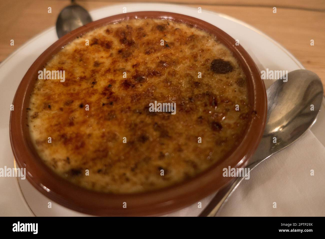 Food in clay dish, Le Bouchon du Palais, Dijon, France Stock Photo - Alamy