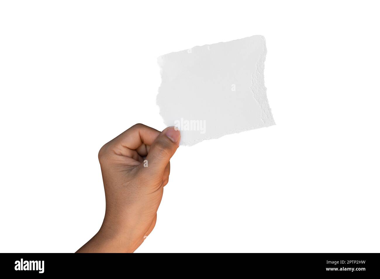 Hand holding ripped torn paper isolated on white background with ...