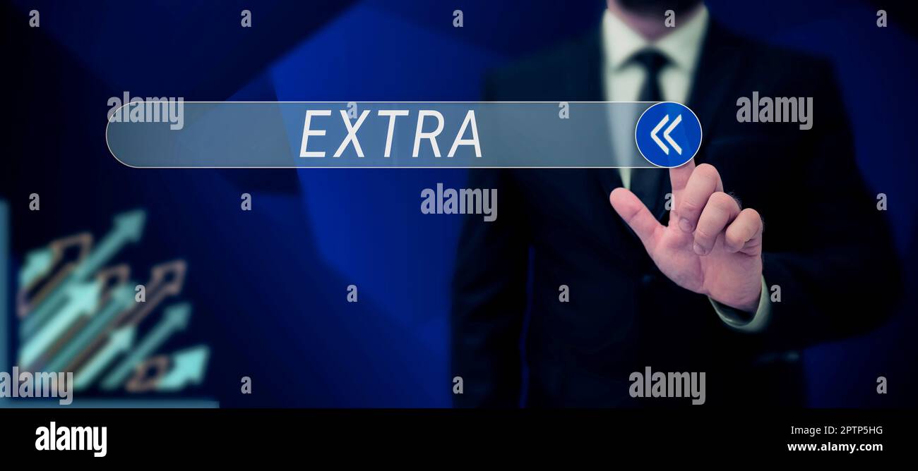 Hand writing sign Extra, Business approach Added to existing or usual ...