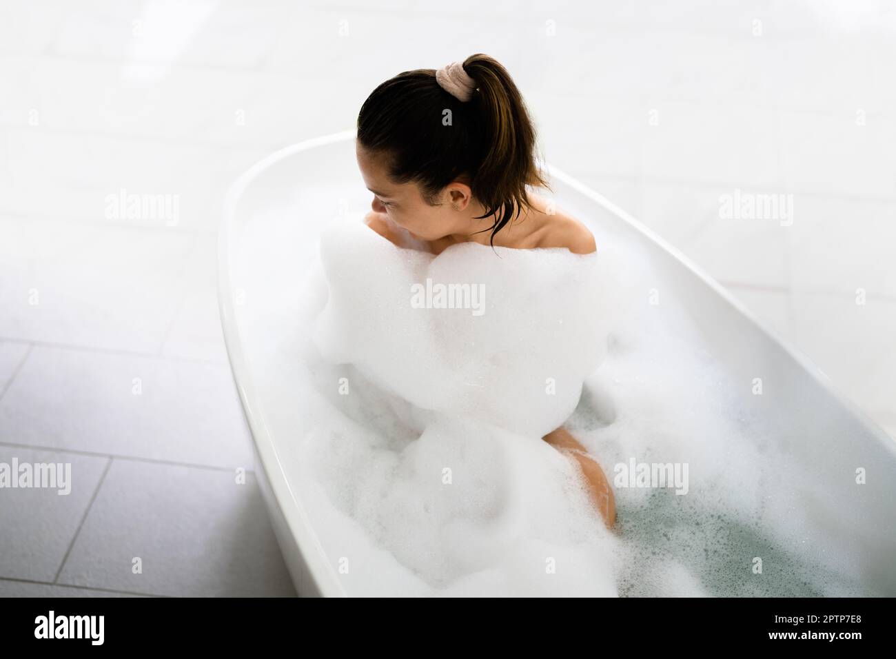 Beautiful Woman Body Spa Care In White Bathroom Stock Photo - Alamy
