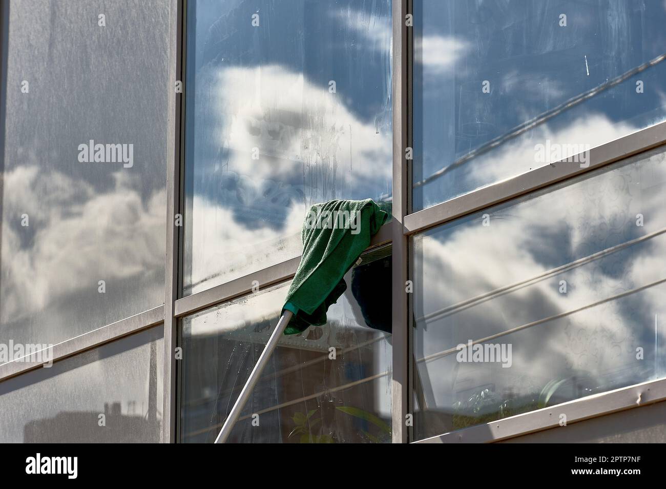 window washing, washing a street shop window. High quality photo Stock ...