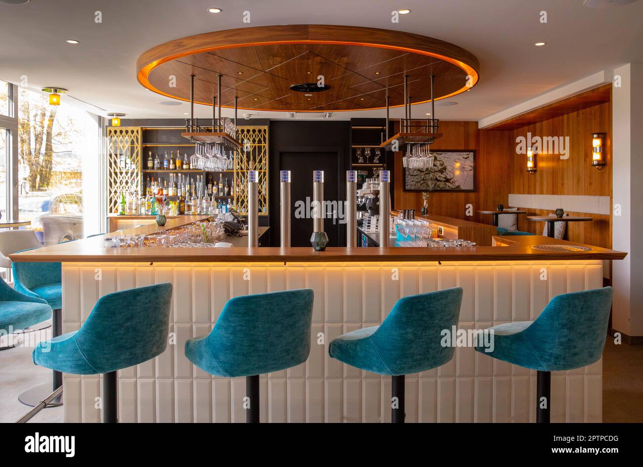 Hotel bar interior, high leg chairs Stock Photo - Alamy