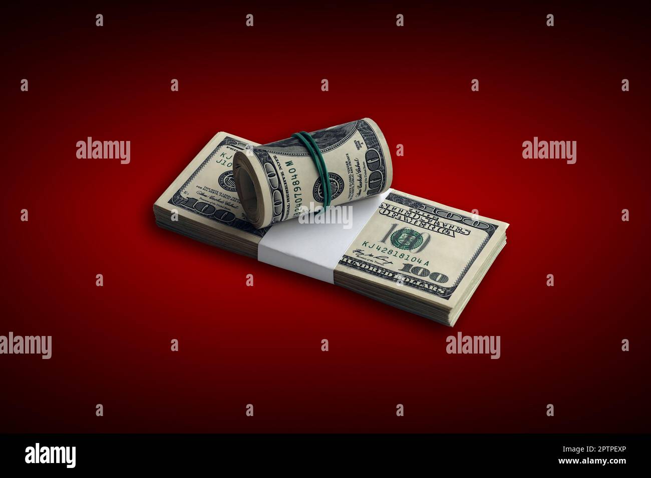 Bundle of US dollar bills on crimson red background. Pack of american ...