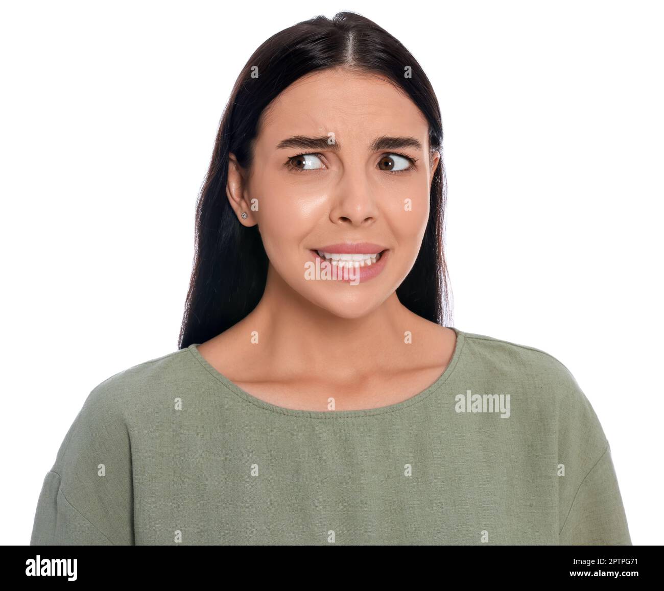 Embarrassed young woman in shirt on white background Stock Photo - Alamy